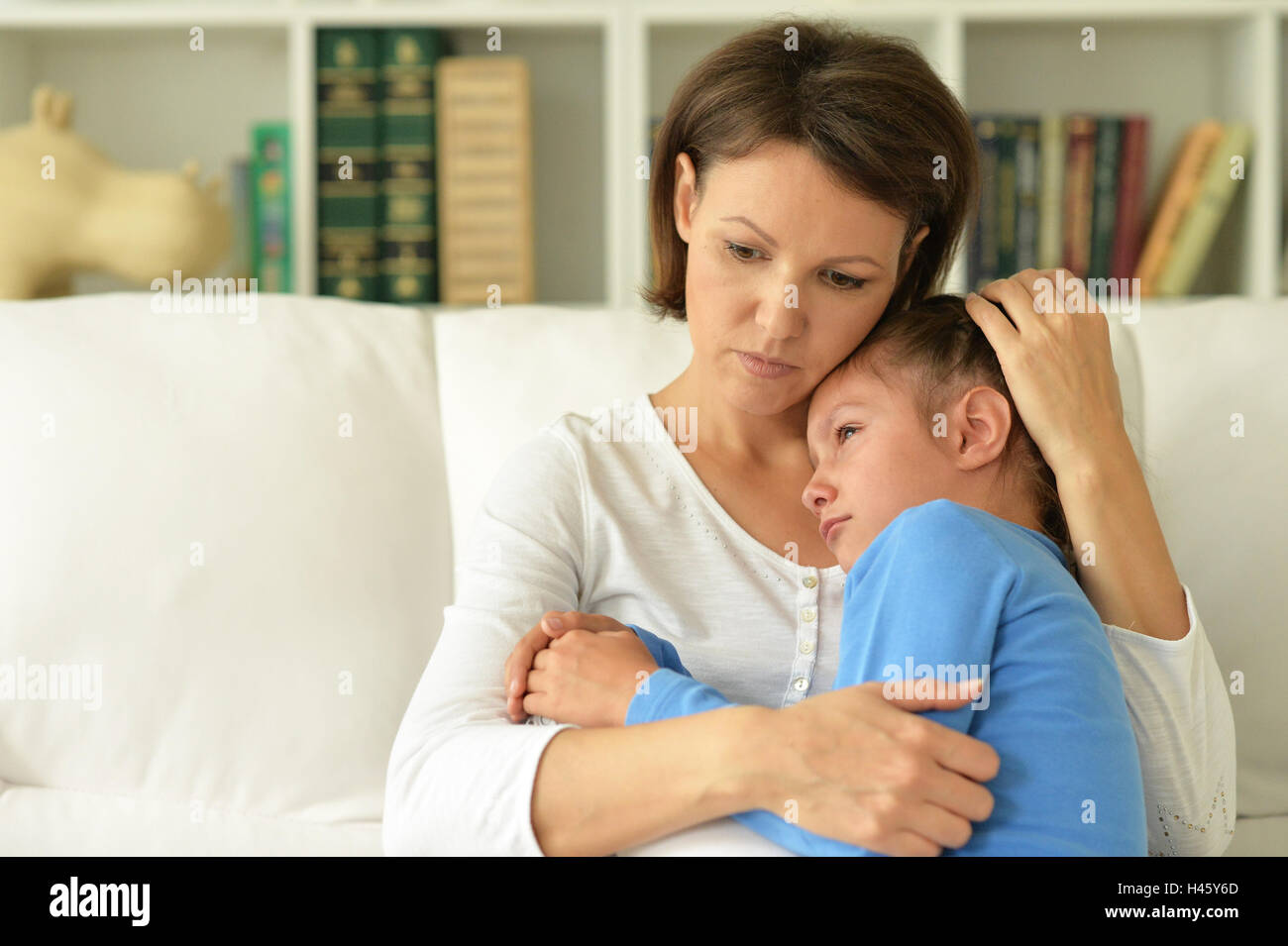 Sad mom and daughter Stock Photo - Alamy