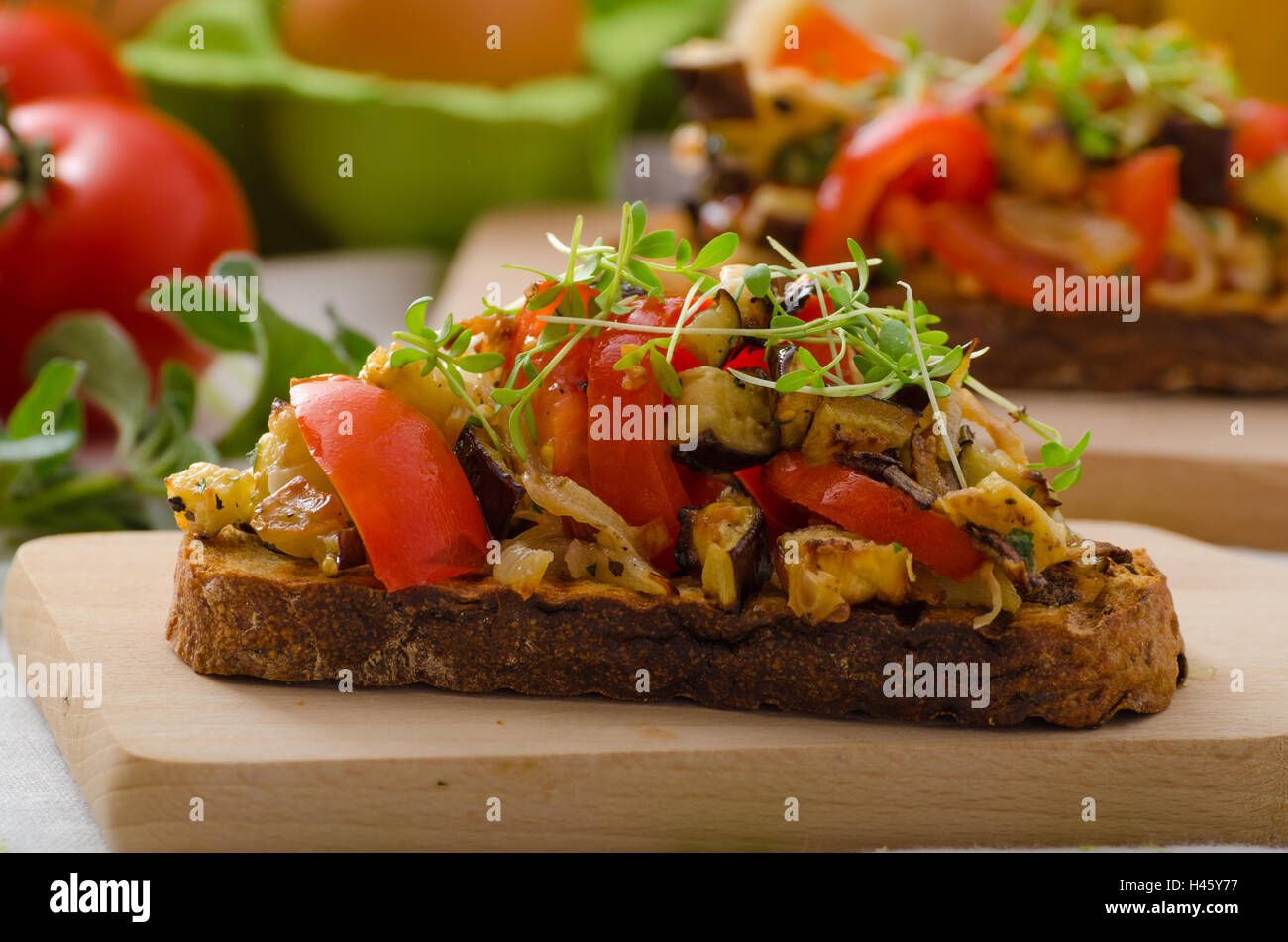 Healthy dinner - a panini toast with Mediterranean vegetables and herbs ...