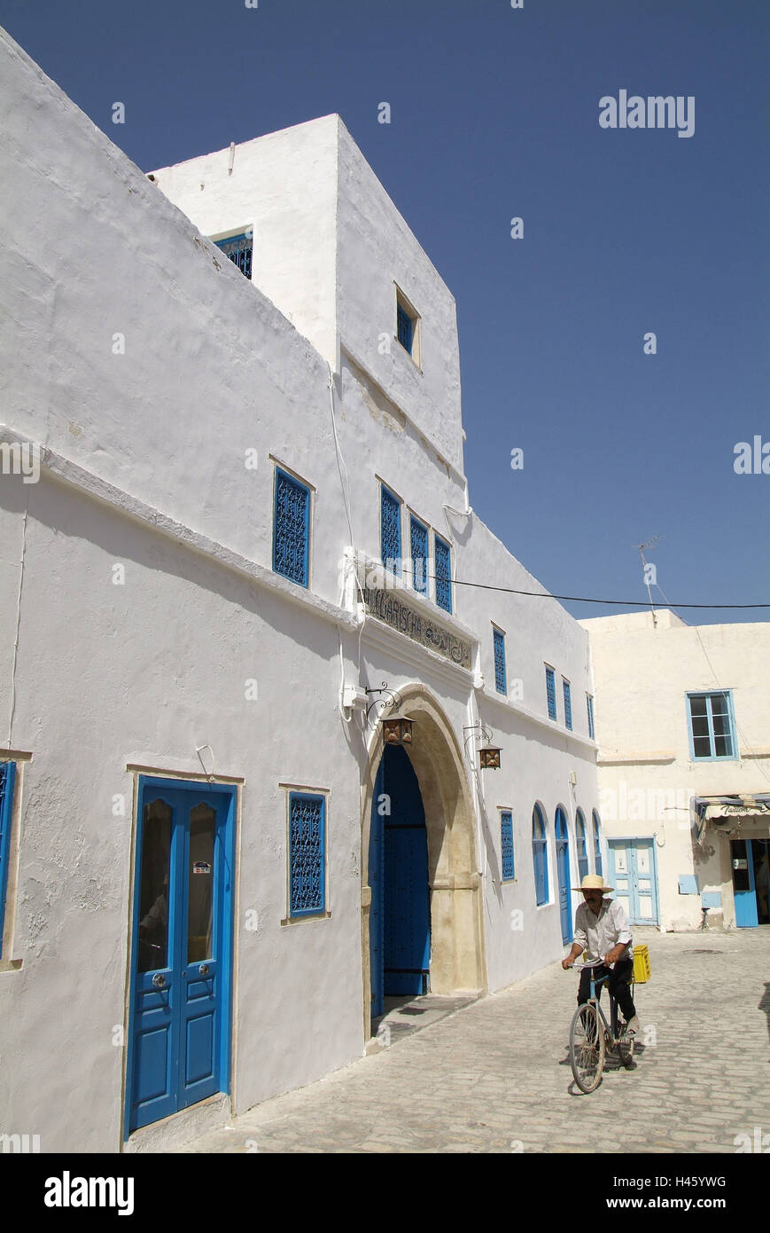 Tunisia, Djerba, Houmt-Souk, bazaar, houses, cyclists Stock Photo - Alamy