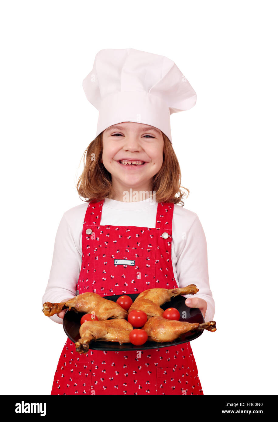 happy little girl cook with chicken drumstick Stock Photo - Alamy