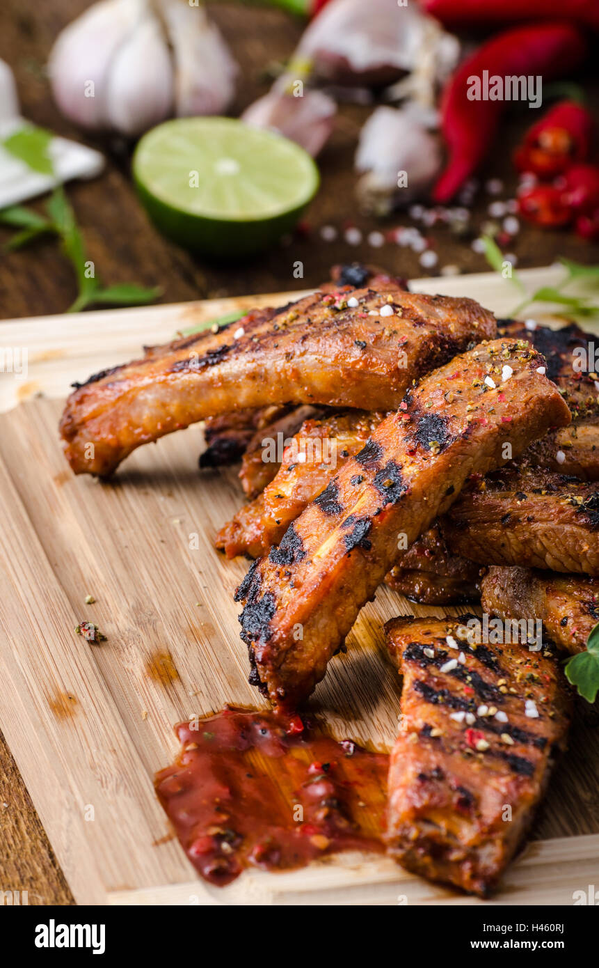 Ribs in spicy marinade with chilli, honey and beer. homemade rustic ...