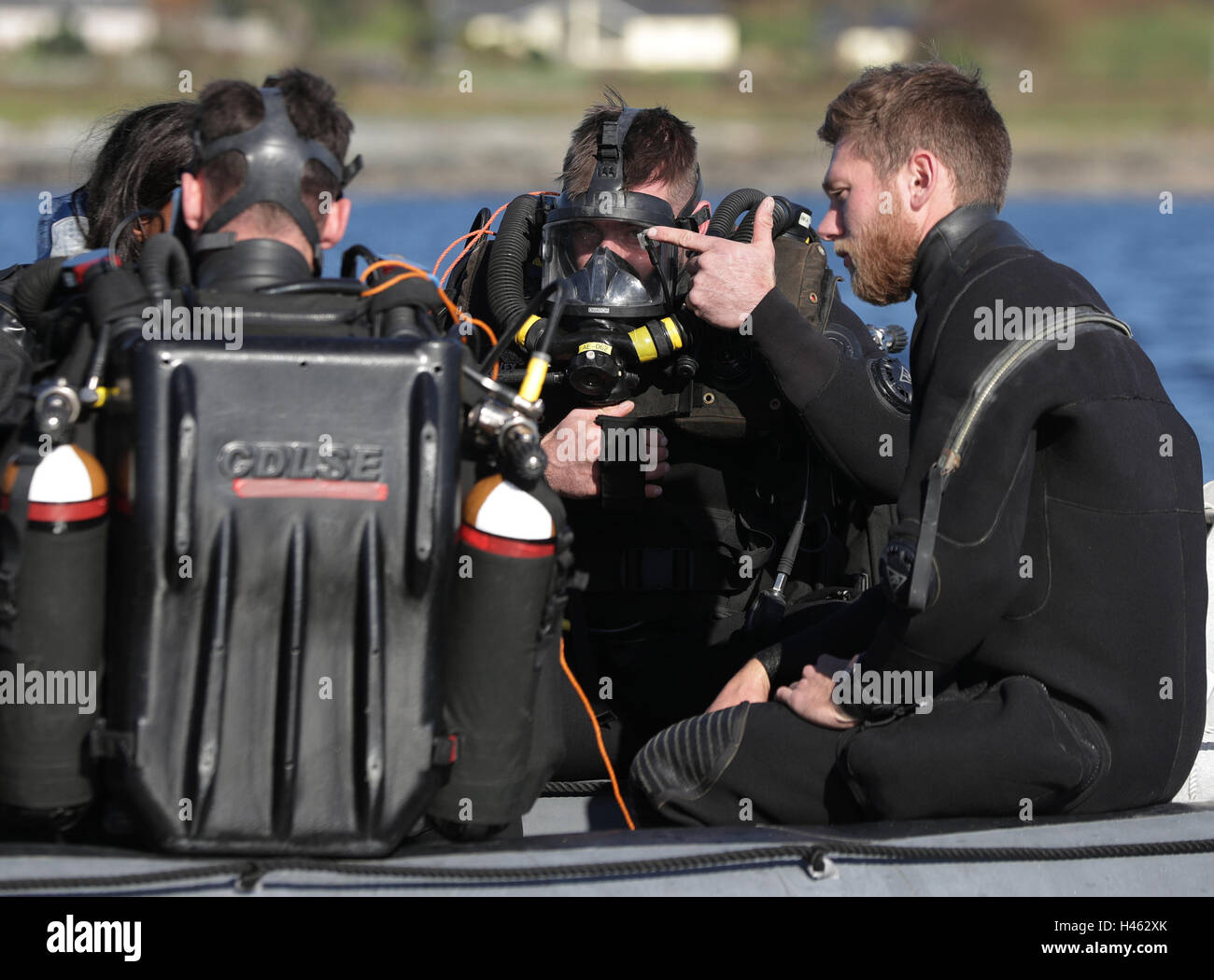Embargoed until 1900 Thursday October 13 A Royal Navy diver makes a ...
