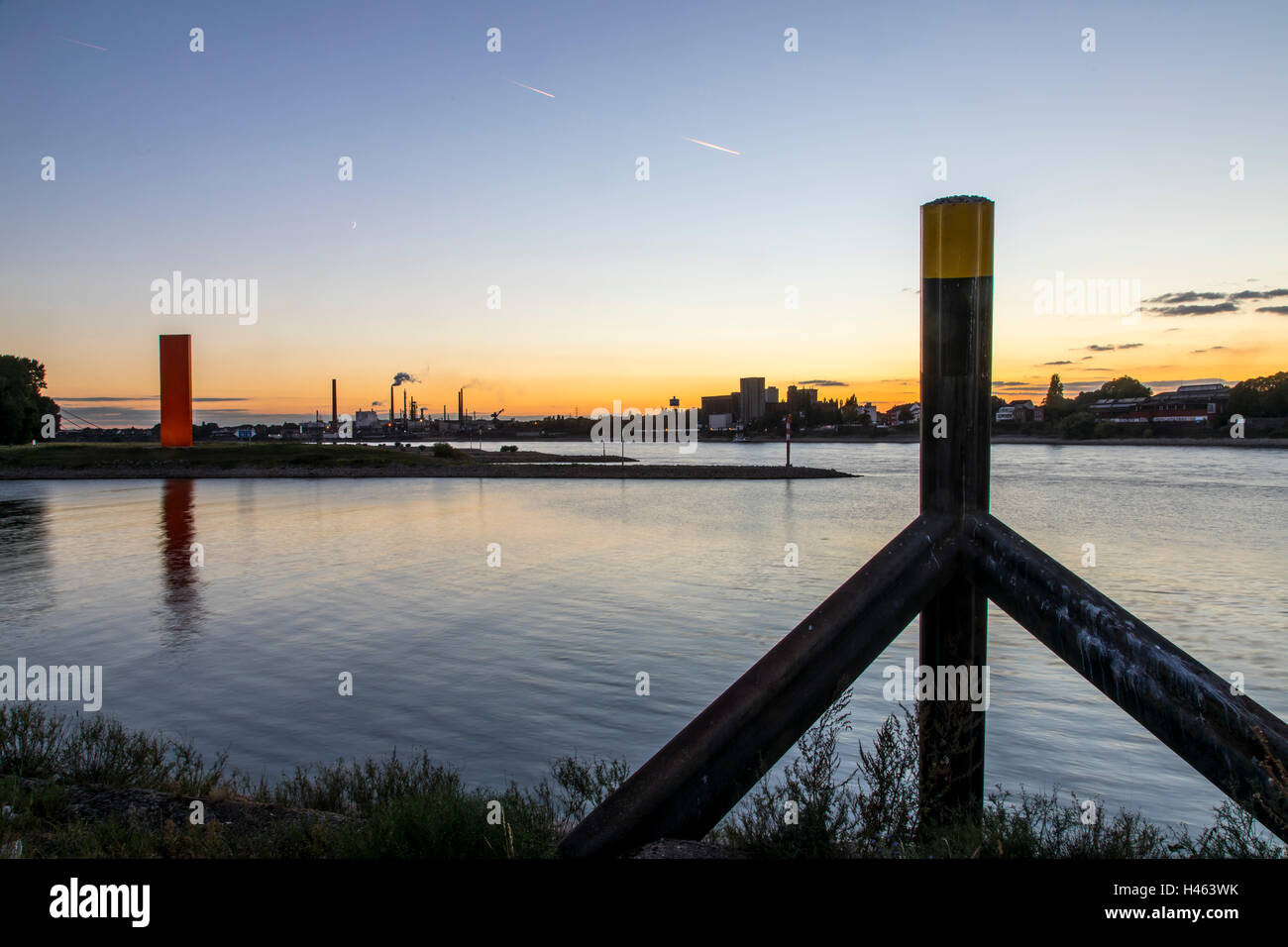 Steel sculpture Rheinorange at river mouth of Ruhr river into the Rhine ...