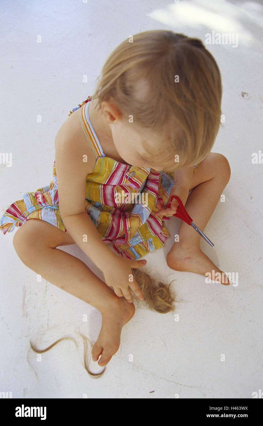 Girl, sitting, scissors, hair, cut off Stock Photo - Alamy
