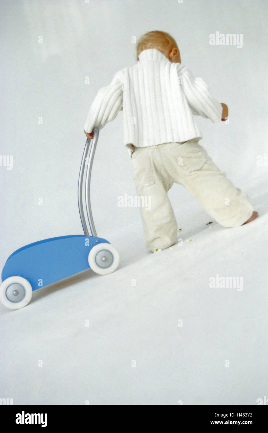 Baby, boy, standing, back view Stock Photo - Alamy