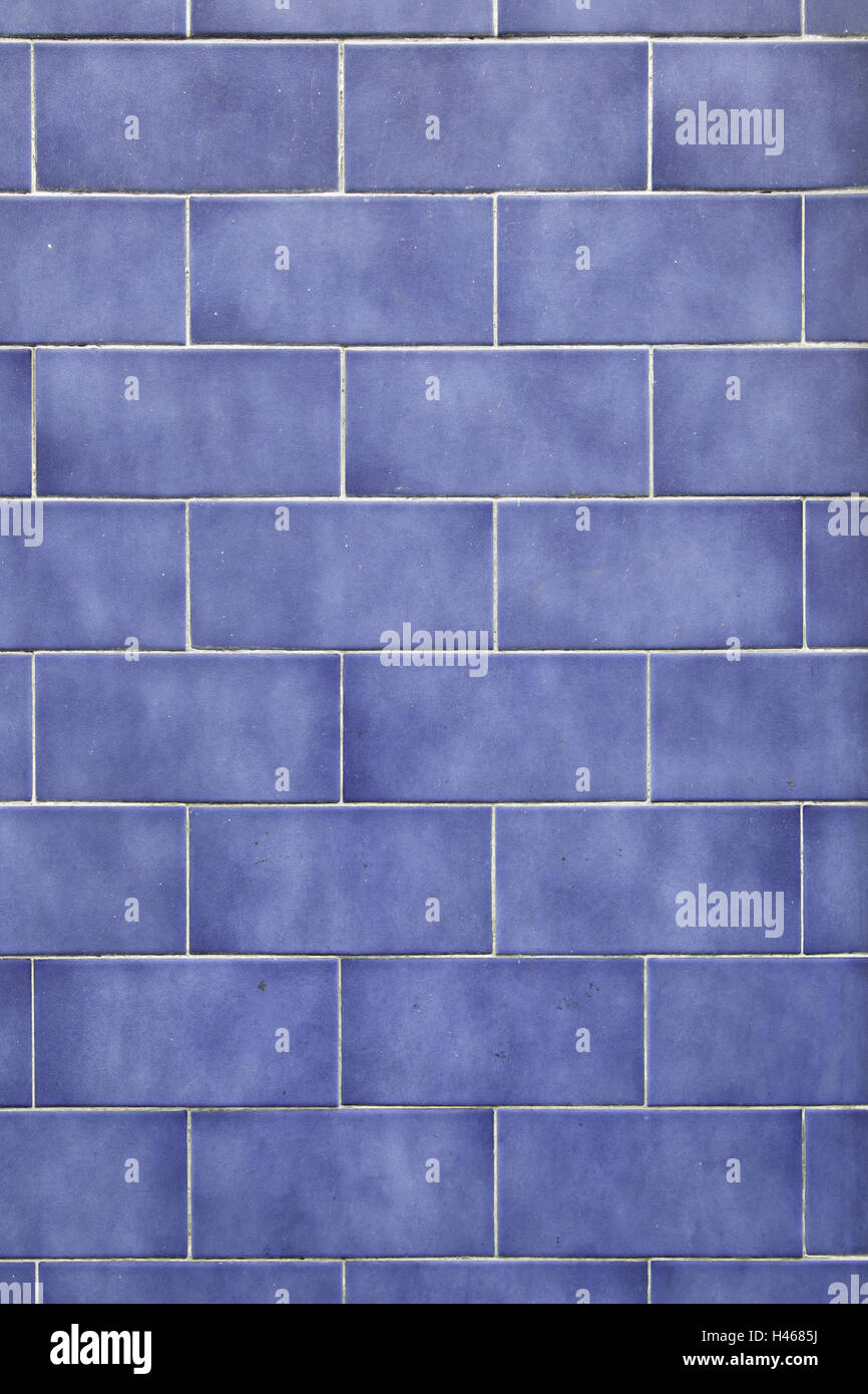Blue tile wall urban street, construction Stock Photo - Alamy