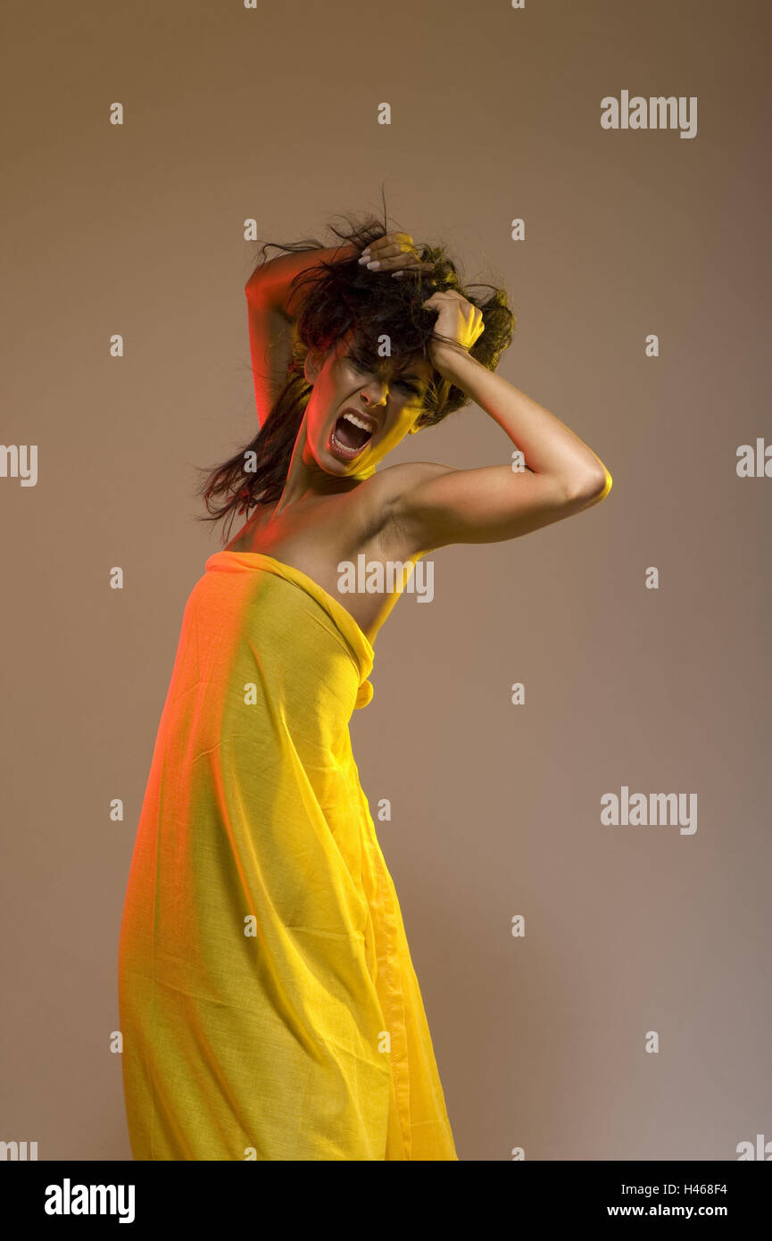 Woman, young, exotic, shout, dance, cloth, yellow, pose, side view ...