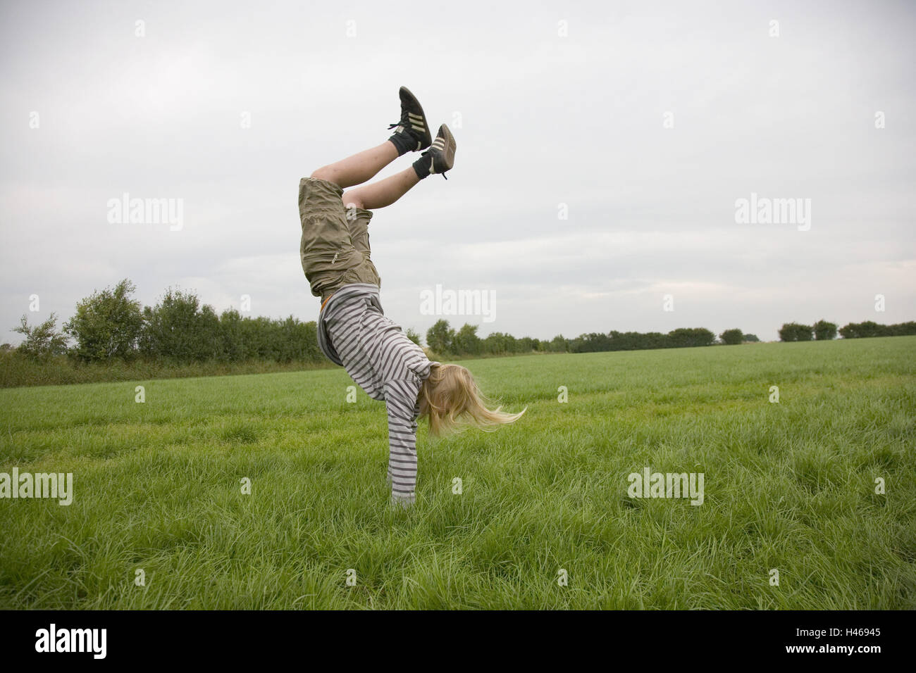 Boy, teenager, meadow, hand state Stock Photo - Alamy