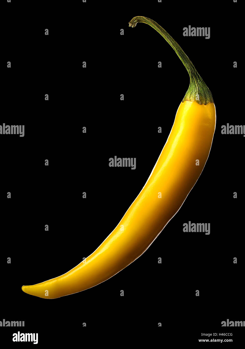 Hot yellow chilli pepper isolated on black Stock Photo - Alamy