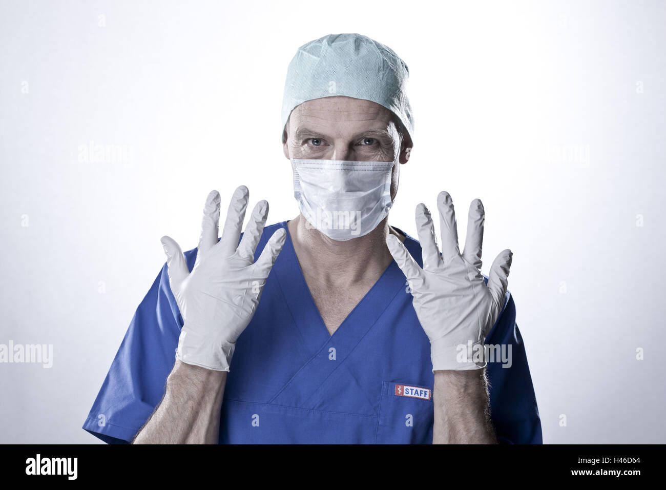 Op. doctor shows hands with gloves, portrait Stock Photo - Alamy