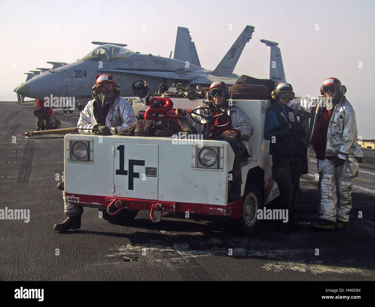 Us navy flight deck tractor hi-res stock photography and images - Alamy