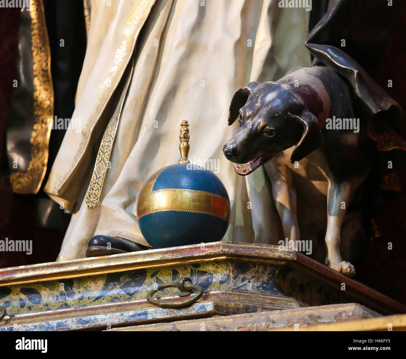 Statue of a dog at the feet of St Dominic, in the Convento de San ...