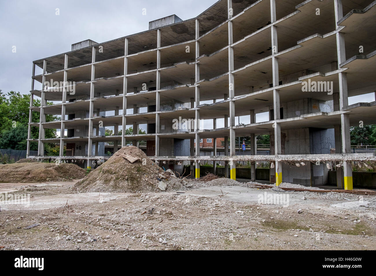 A large abandoned and unfinished building of an office block left to ...