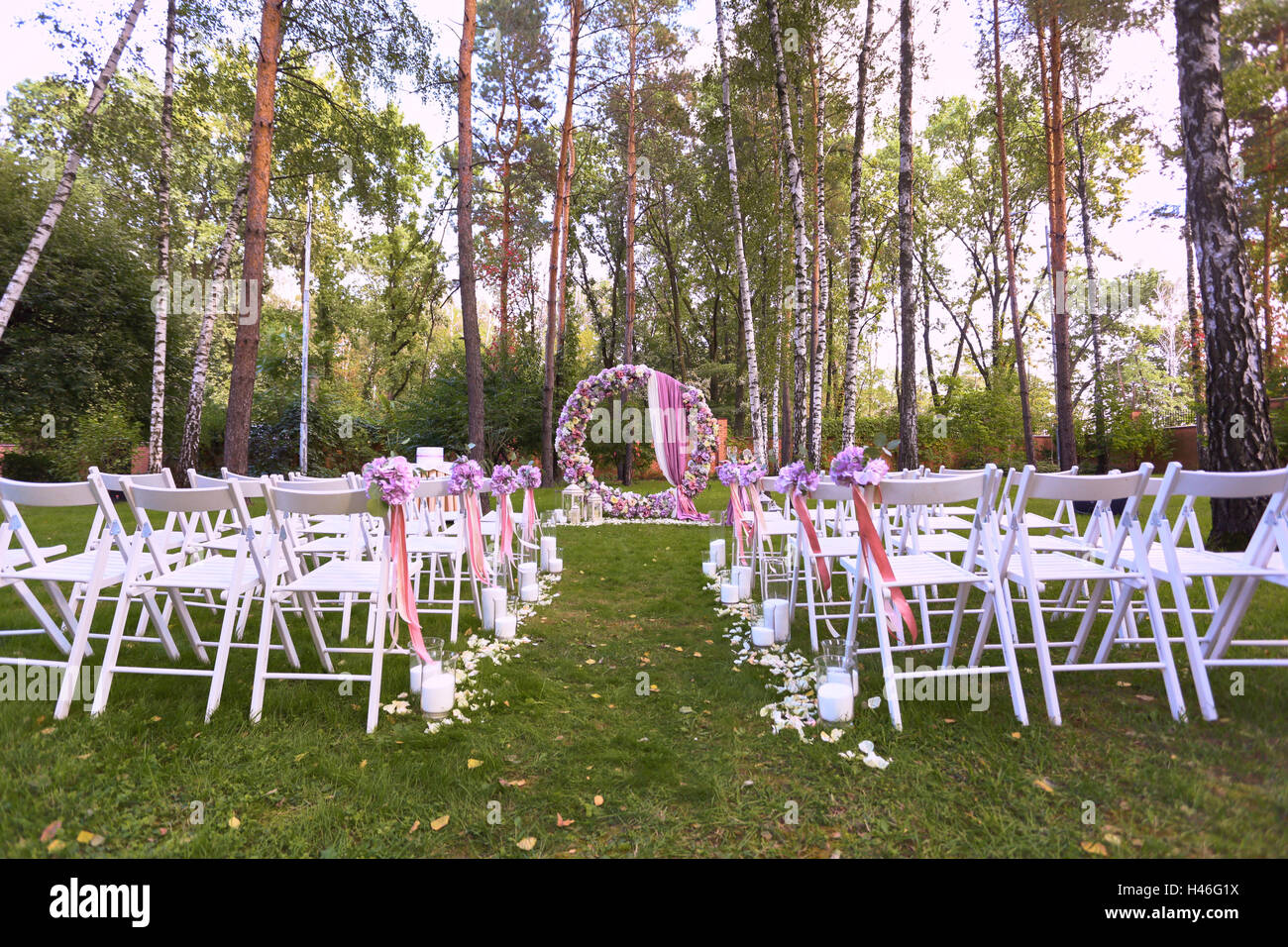 Beautiful wedding set up. ceremony place in the forest Stock Photo - Alamy