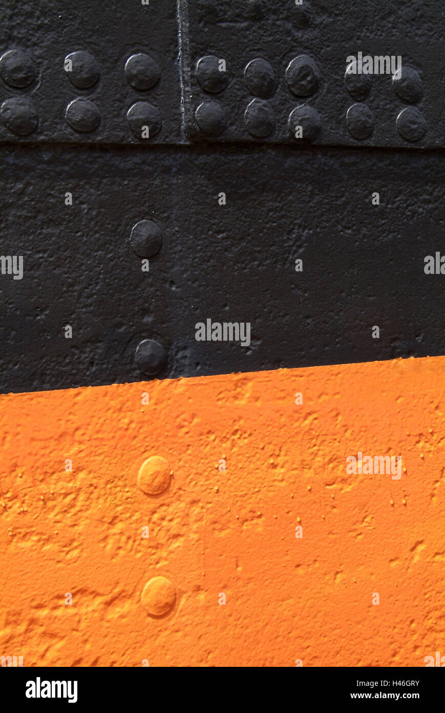 Hull, rivets, orange, black Stock Photo - Alamy