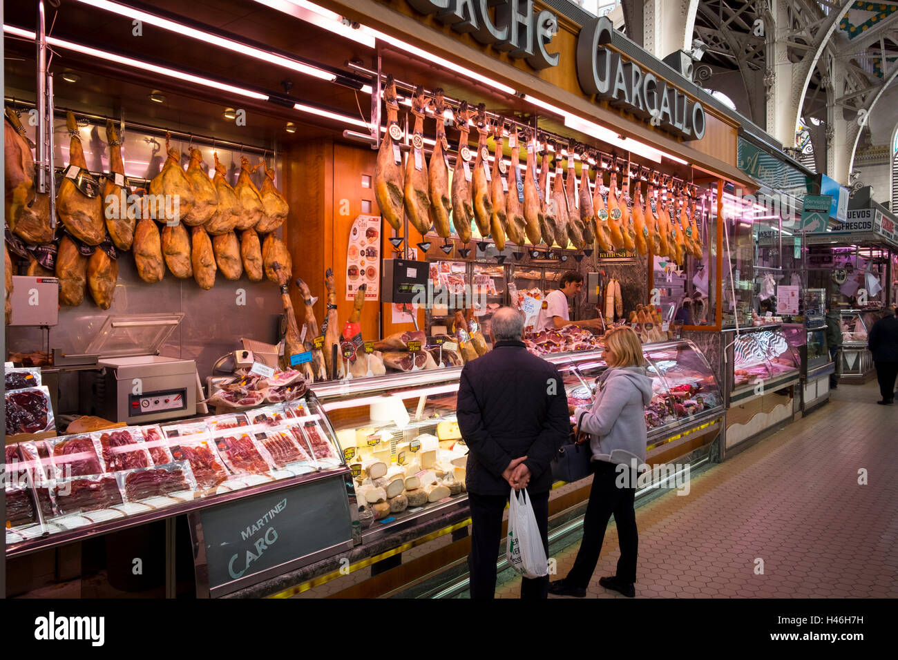 Meat stall in the indoor Central Market in Valencia Stock Photo - Alamy