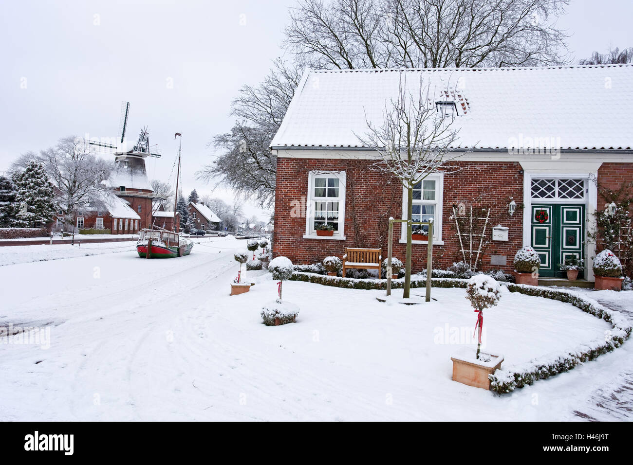 East Friesland, winter mood, house, boat, windmill Stock Photo - Alamy