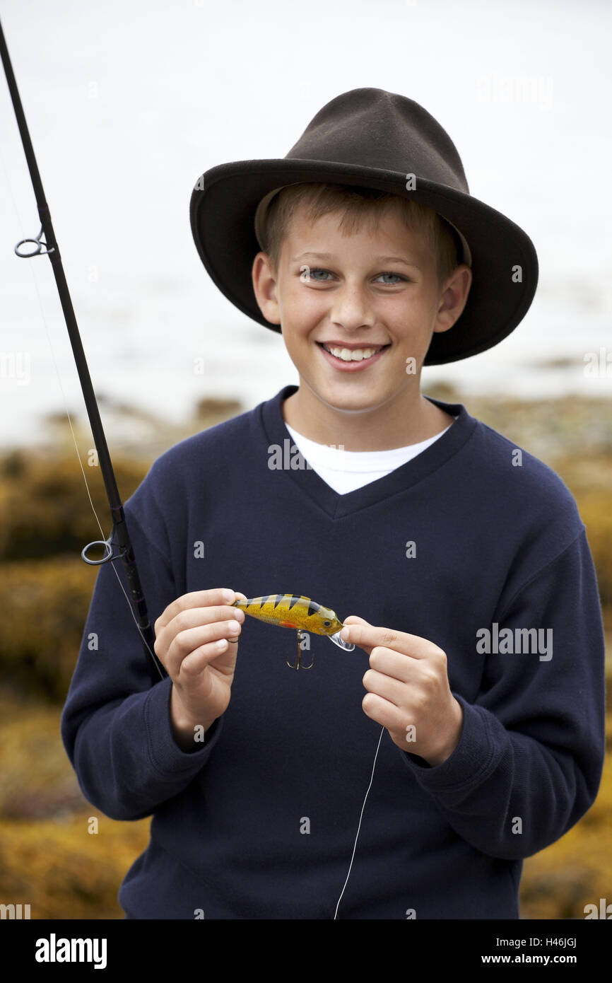 Boy, fishing rod, lakesides Stock Photo - Alamy