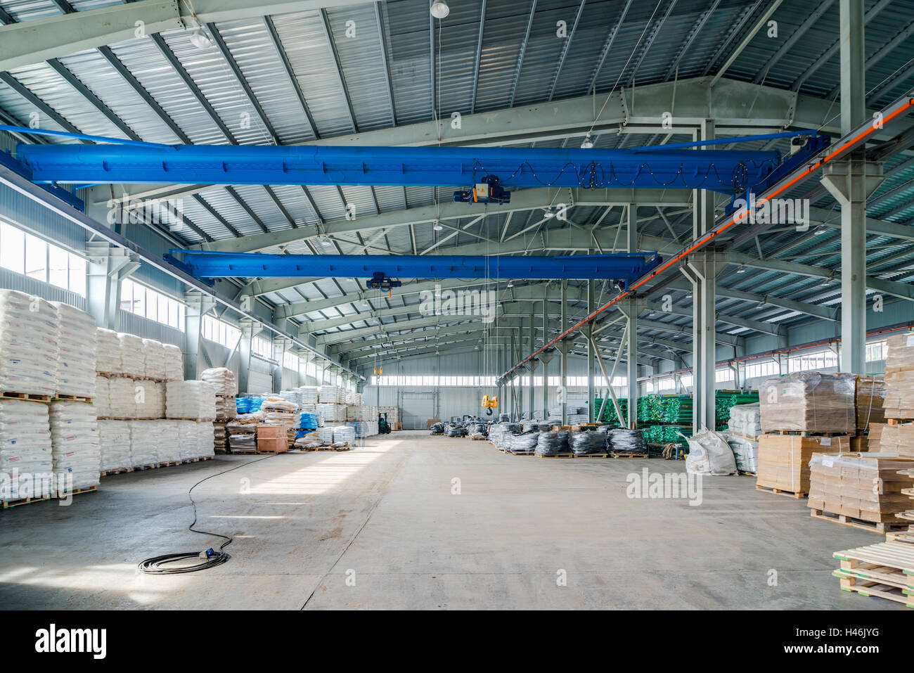 Interior of new warehouse Stock Photo - Alamy