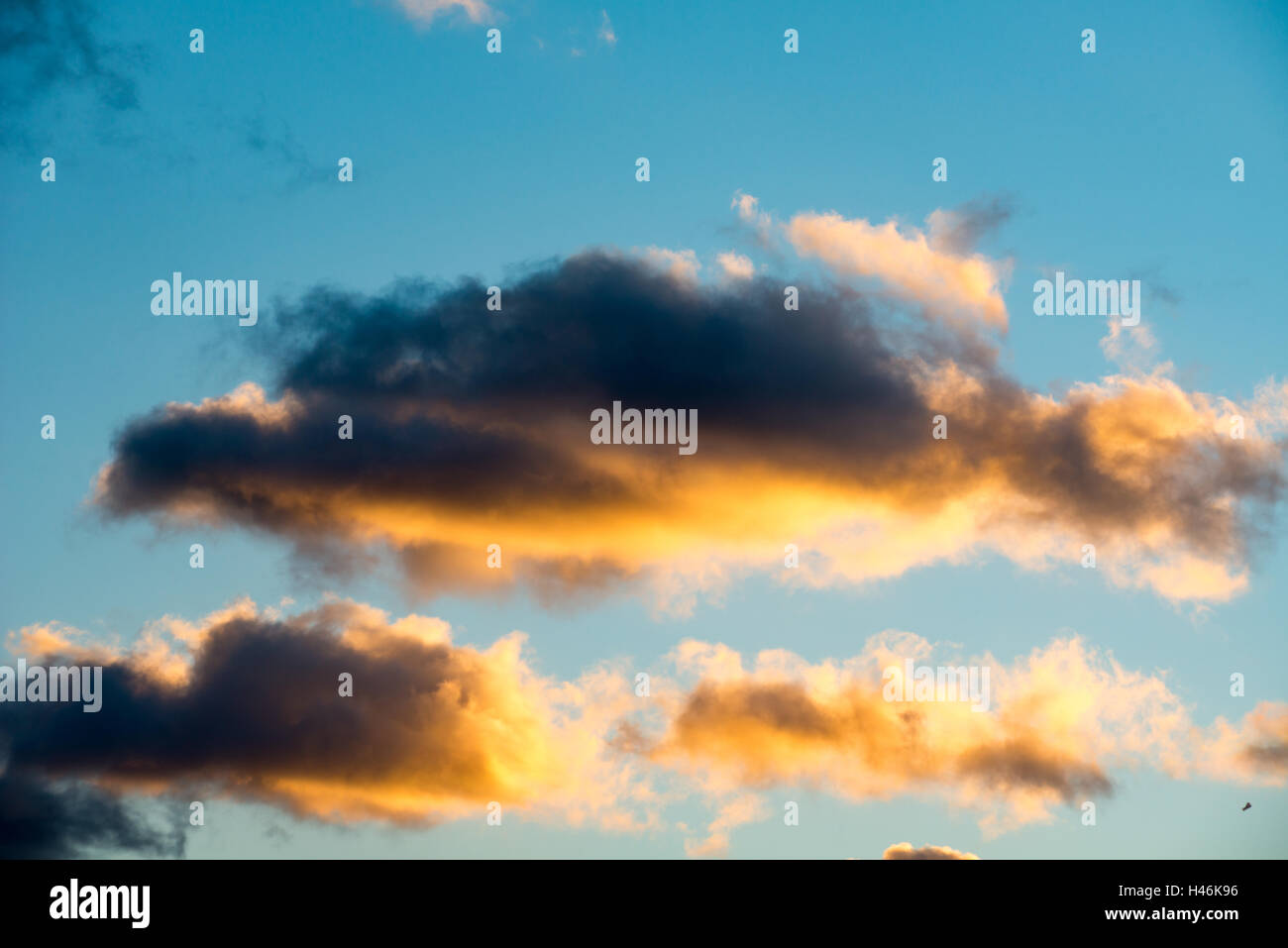 Puffy and colorful sunset clouds Stock Photo - Alamy