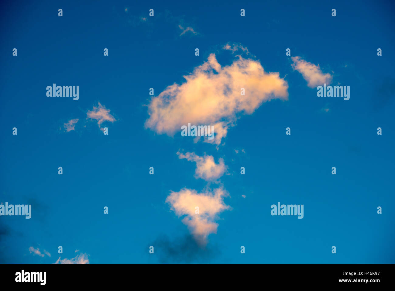 Puffy and colorful sunset clouds Stock Photo - Alamy