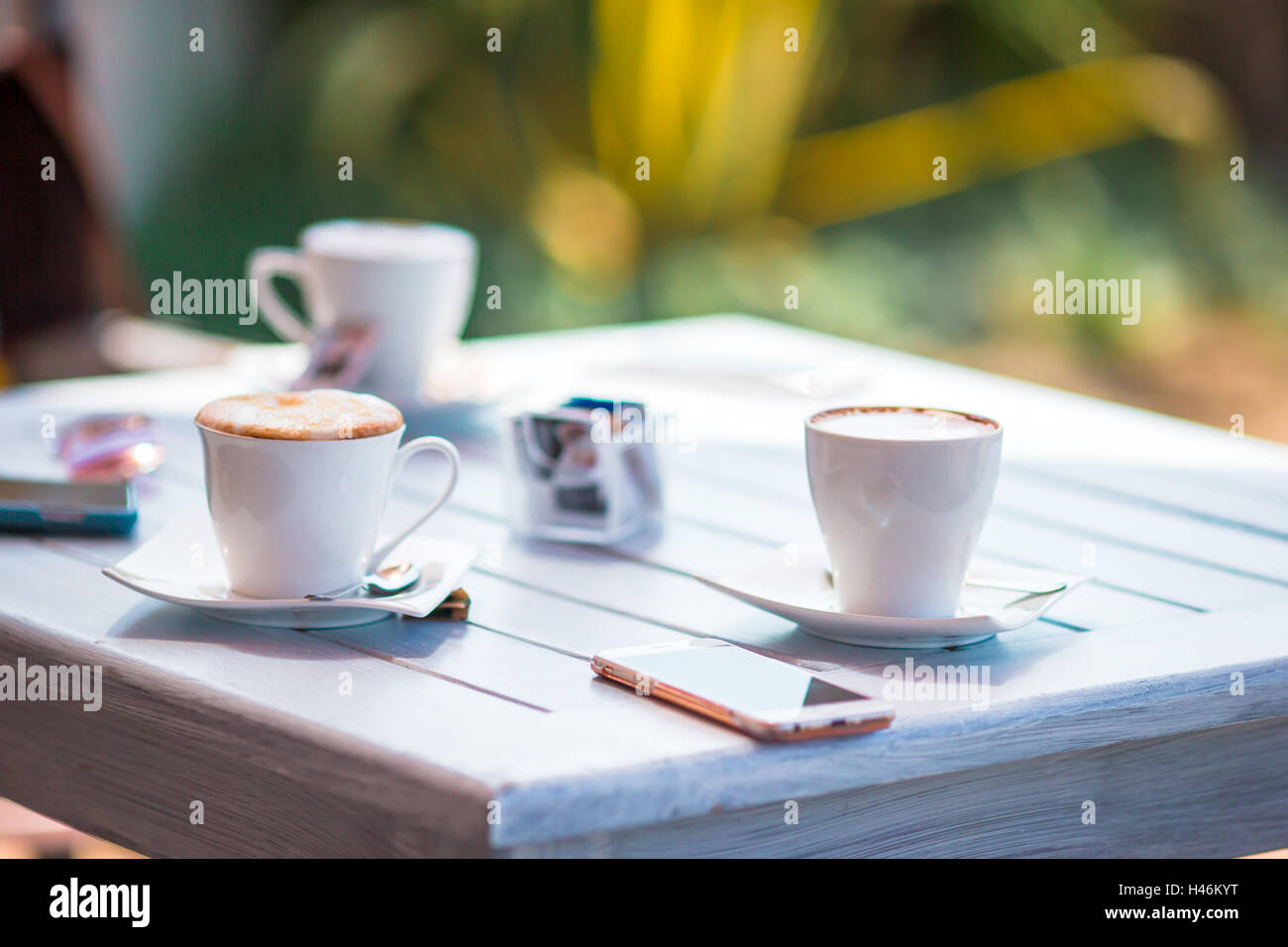 Lunch time, cup of coffee on table in restaraunt outdoor Stock Photo ...
