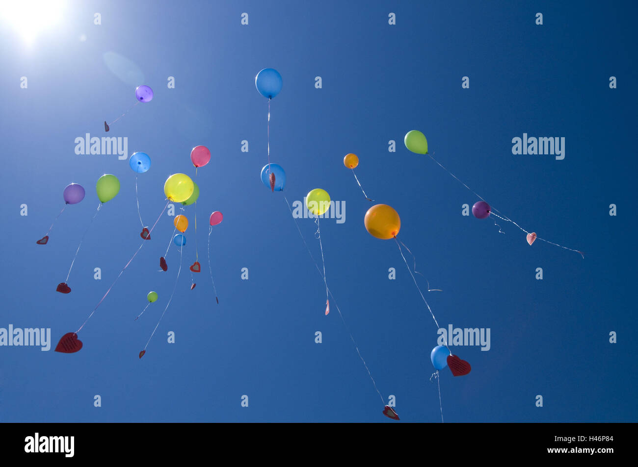Light blue balloons hi-res stock photography and images - Alamy