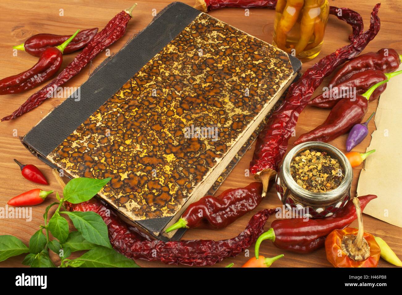 Cookbook and chillies. Recipe for spicy food. Mexican cuisine. Food ...