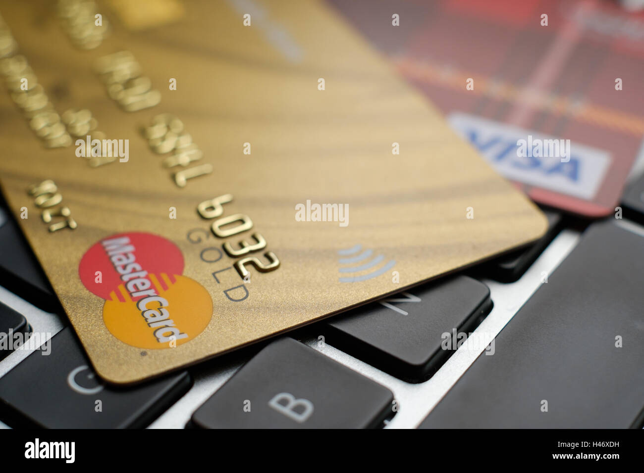 Plastic payment Master Card and Visa macro on the laptop keyboard Stock ...
