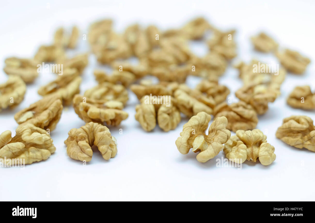 Lots of walnuts on white background Stock Photo - Alamy