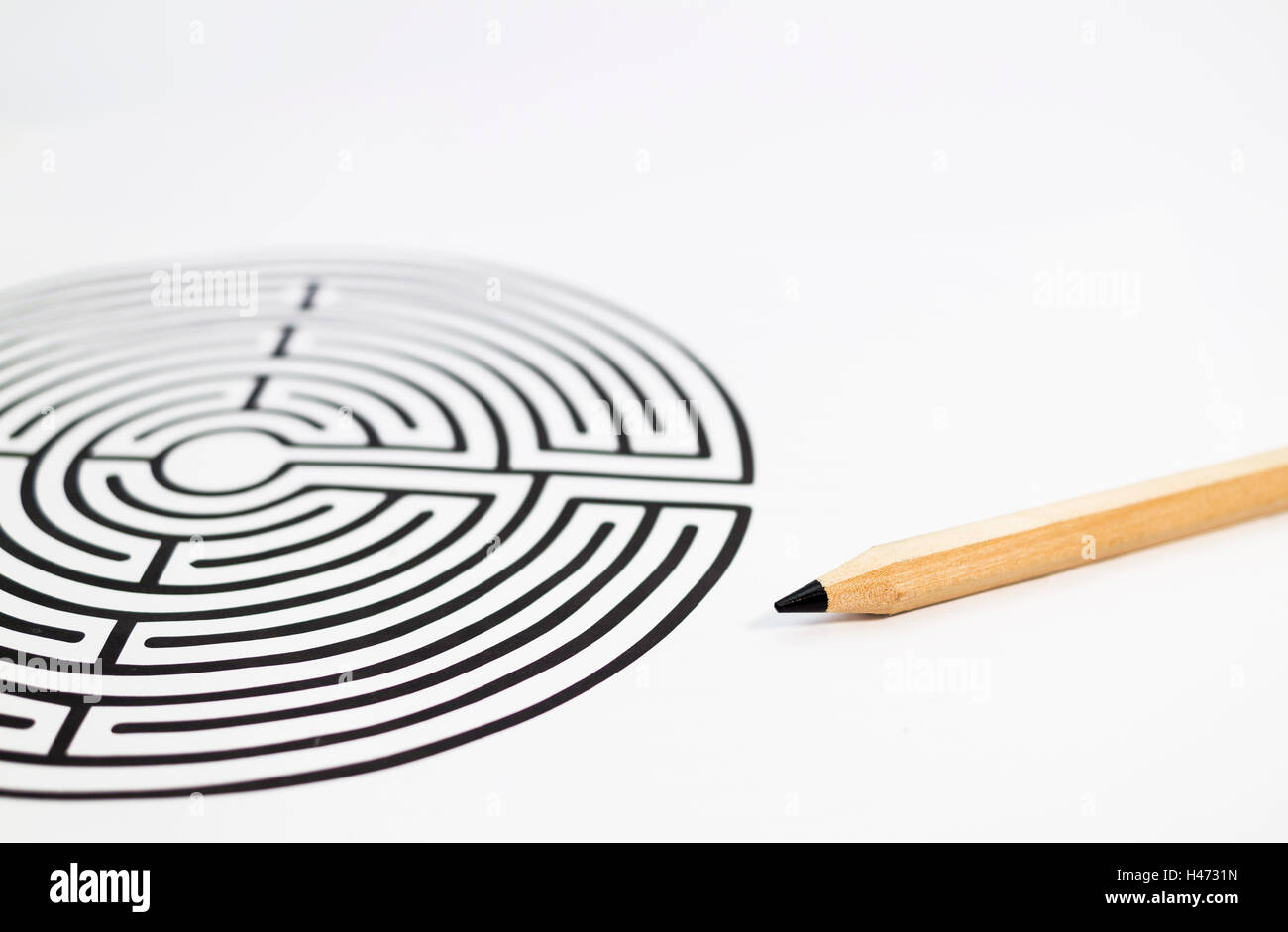 Drawn labyrinth in white background Stock Photo - Alamy
