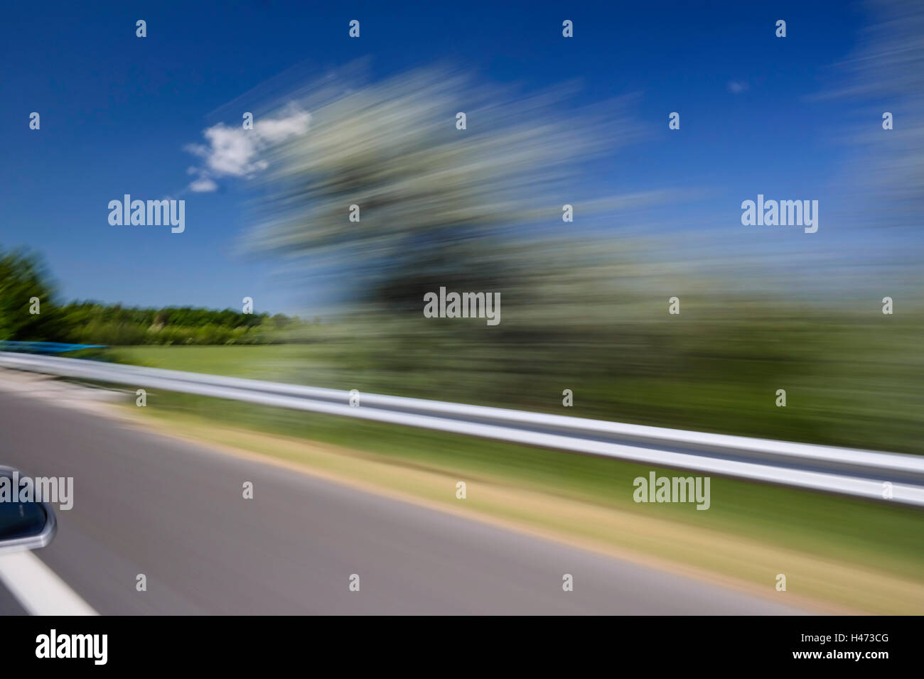 Blurred highway scene from a car window Stock Photo - Alamy