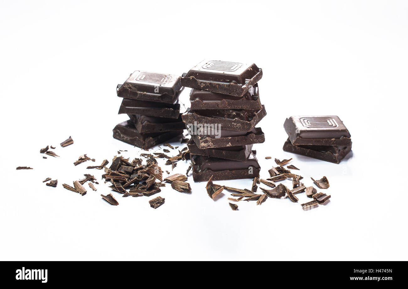 A pile of broken dark chocolate pieces Stock Photo - Alamy
