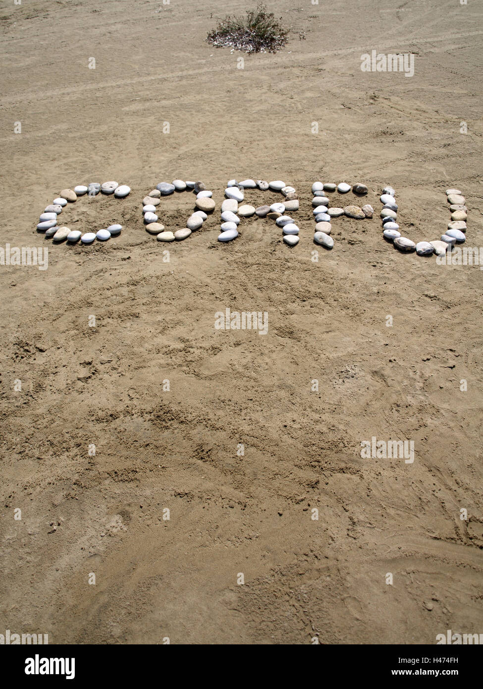 Corfu written in pebbles at Agnos Beach, Corfu Greece Stock Photo - Alamy