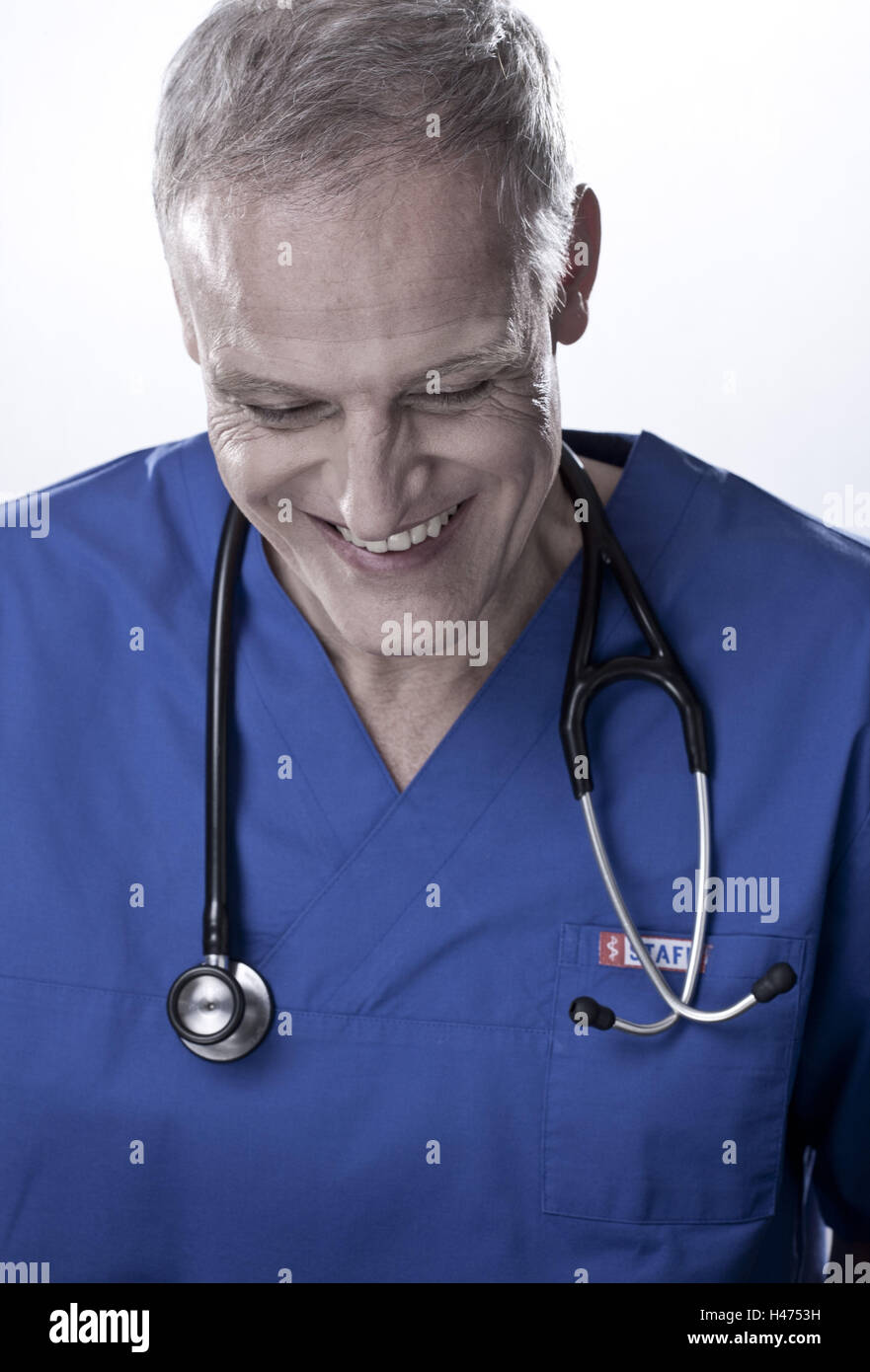 Op. doctor with stethoscope, smile, view lowered, portrait Stock Photo ...