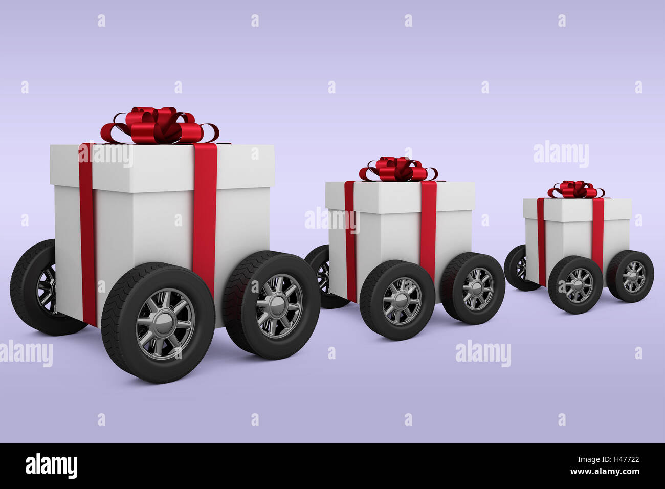 Composite image of gift box with red ribbon on wheels Stock Photo - Alamy