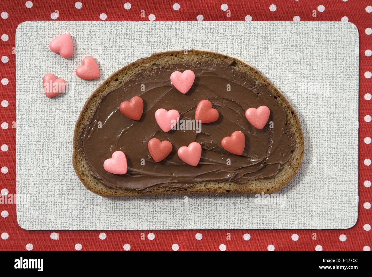 Nutella bread with hearts on a breakfast board Stock Photo - Alamy