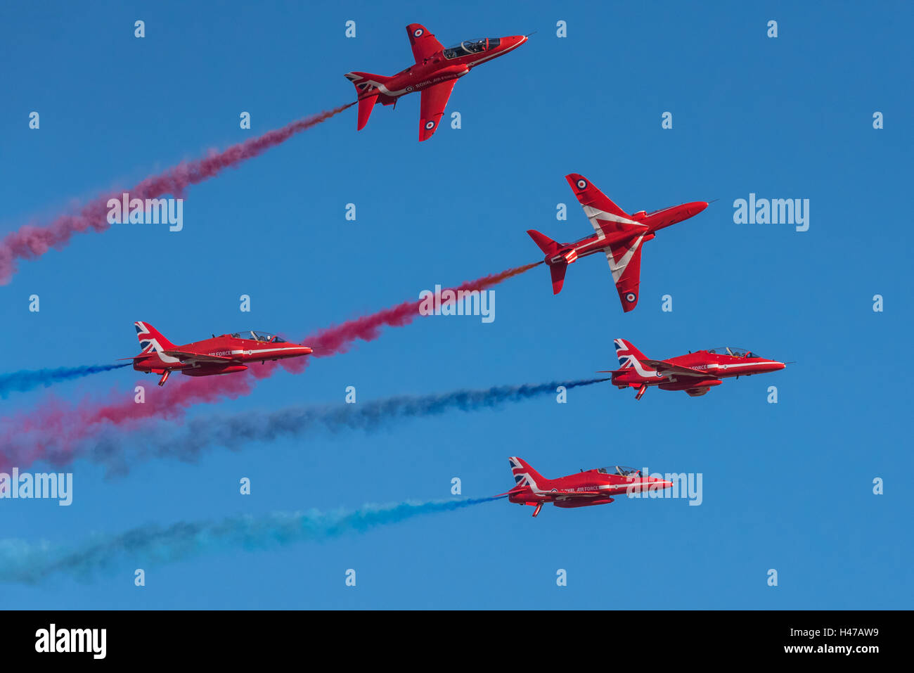 The RAF Red Arrows display team's "Enid" five-ship formation breaking ...