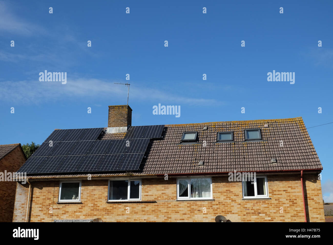 solar panels on a 1960s house Stock Photo - Alamy