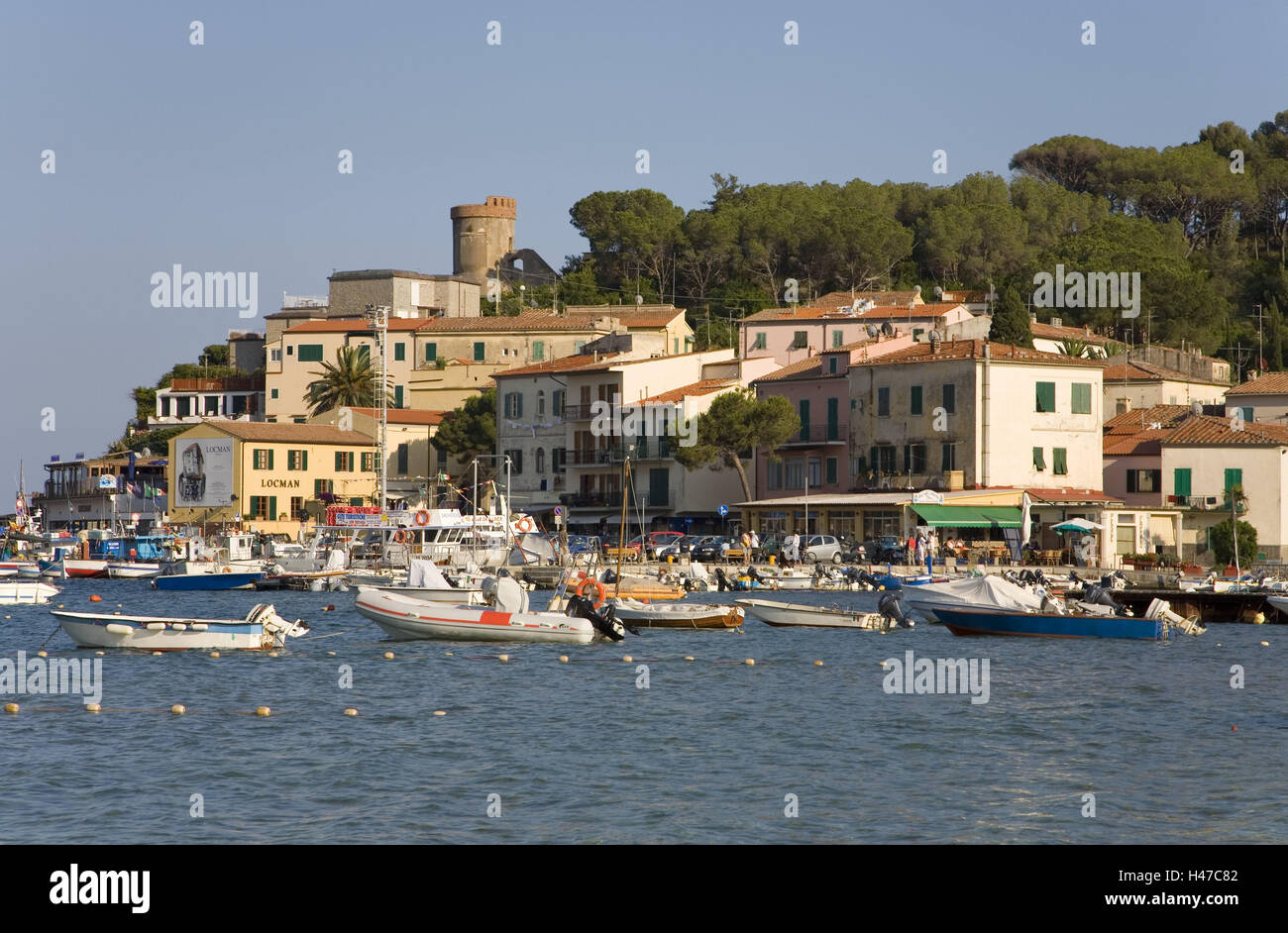 Italy, Tuscany, island Elba, Marina di Campo, town view, fishing boats ...