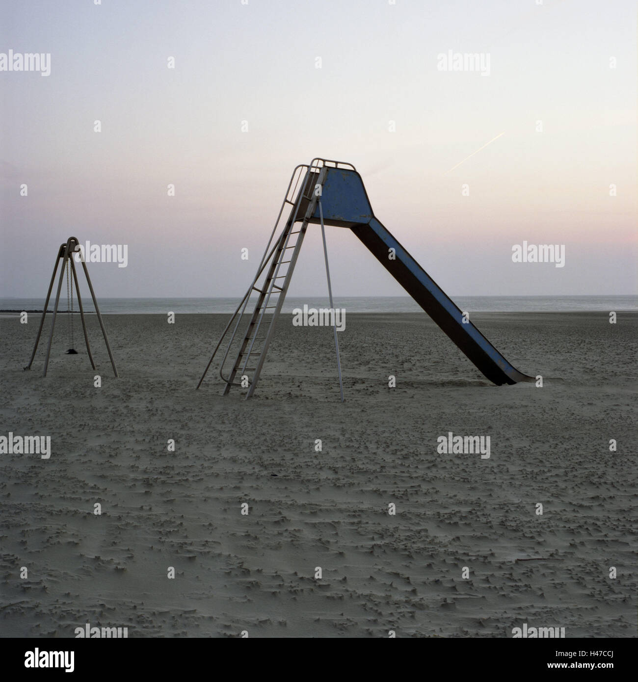 Germany, Lower Saxony, island Borkum, sandy beach, swing, chutes, sea ...