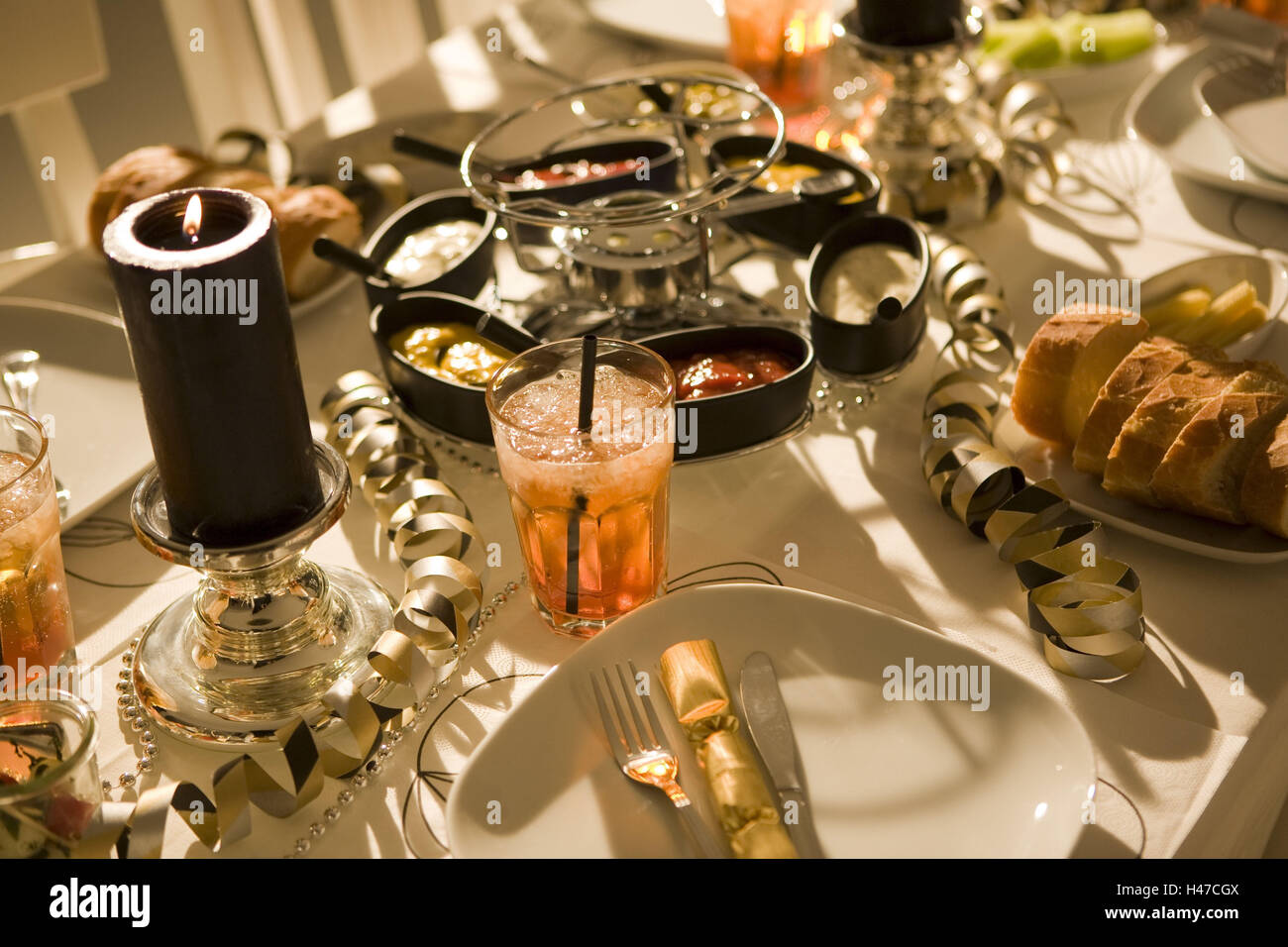 New Year's Eve party, table appointments, fondue, covers, drinks Stock ...