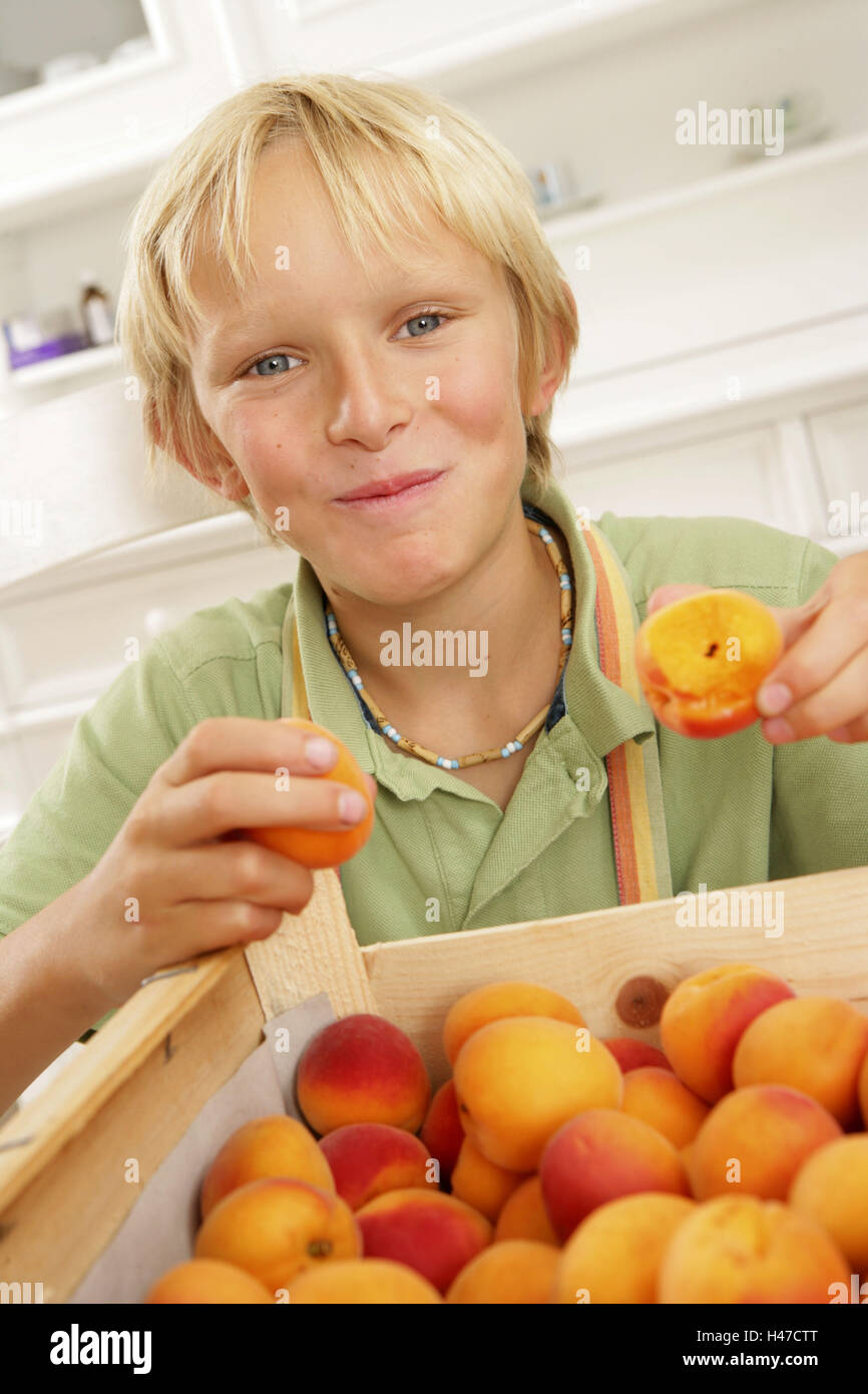 Boy, cuisine, apricots, eat Stock Photo - Alamy