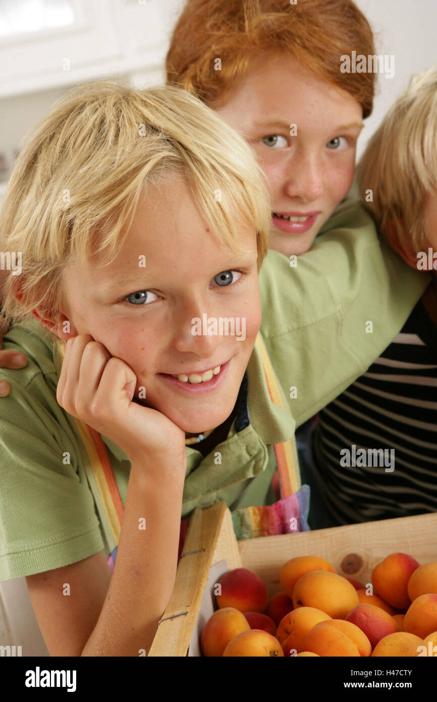 Children, cuisine, happy, smile, apricots Stock Photo - Alamy