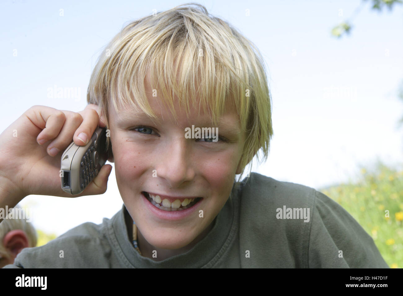 Boy, mobile phone, call up, portrait Stock Photo - Alamy