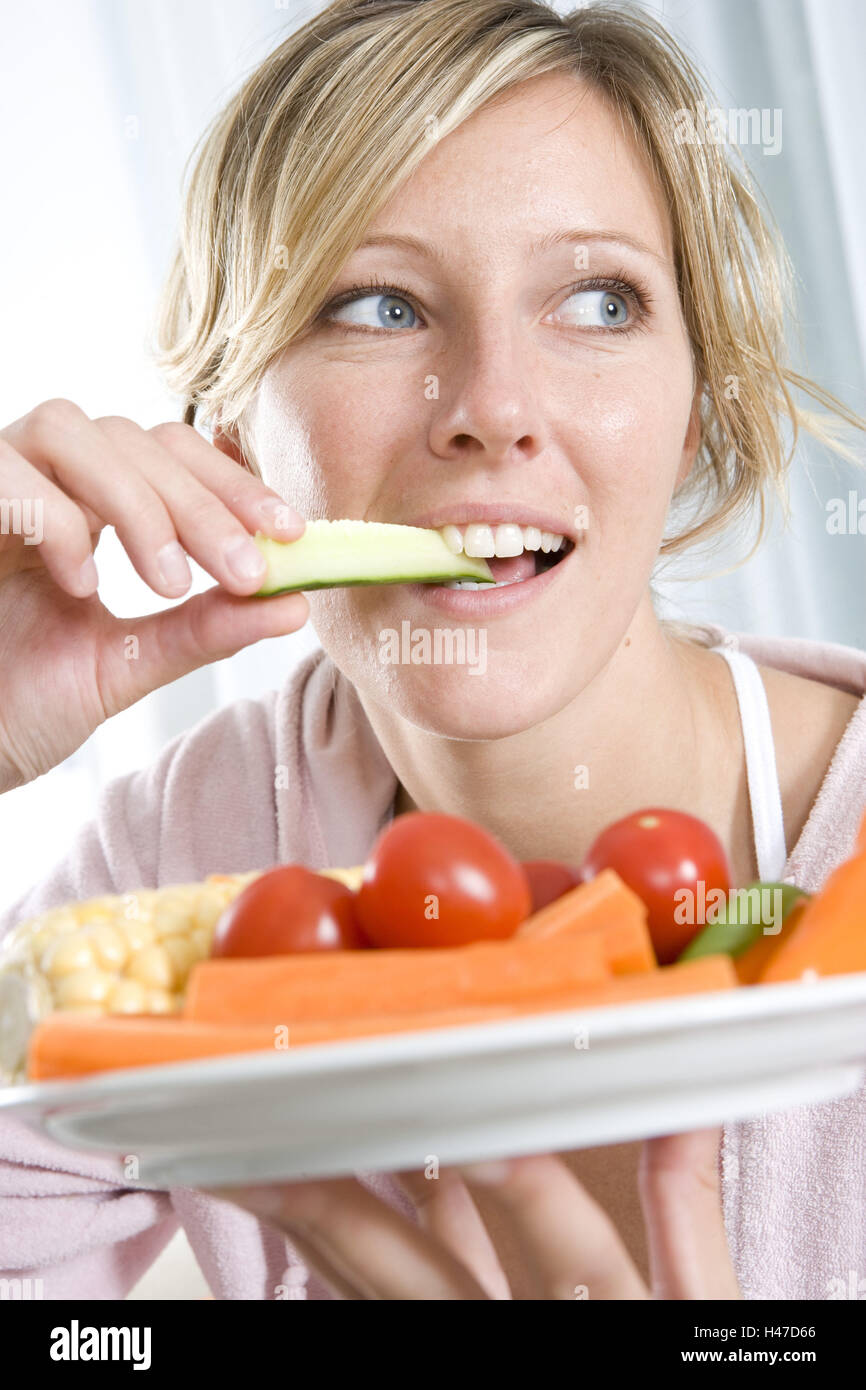 Woman, relaxation, at home, vegetables, eating Stock Photo - Alamy