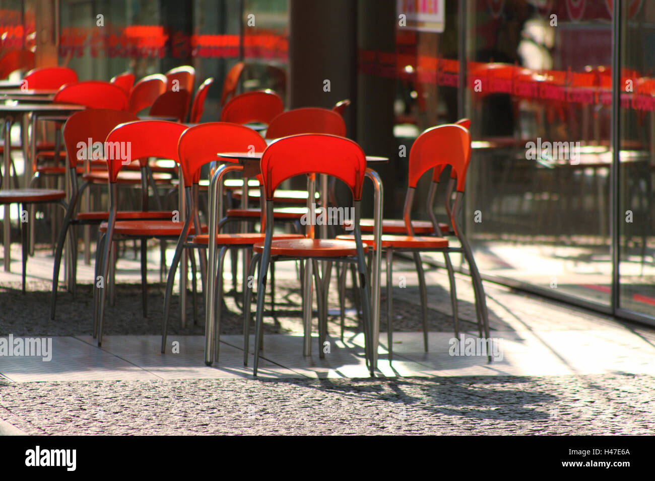 Street cafe, red chairs Stock Photo - Alamy