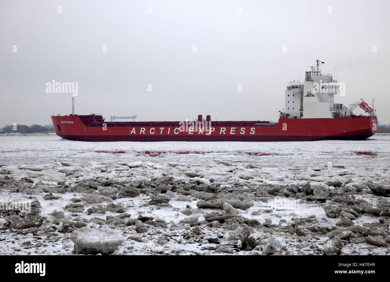 The Elbe, freighter, pack ice Stock Photo - Alamy