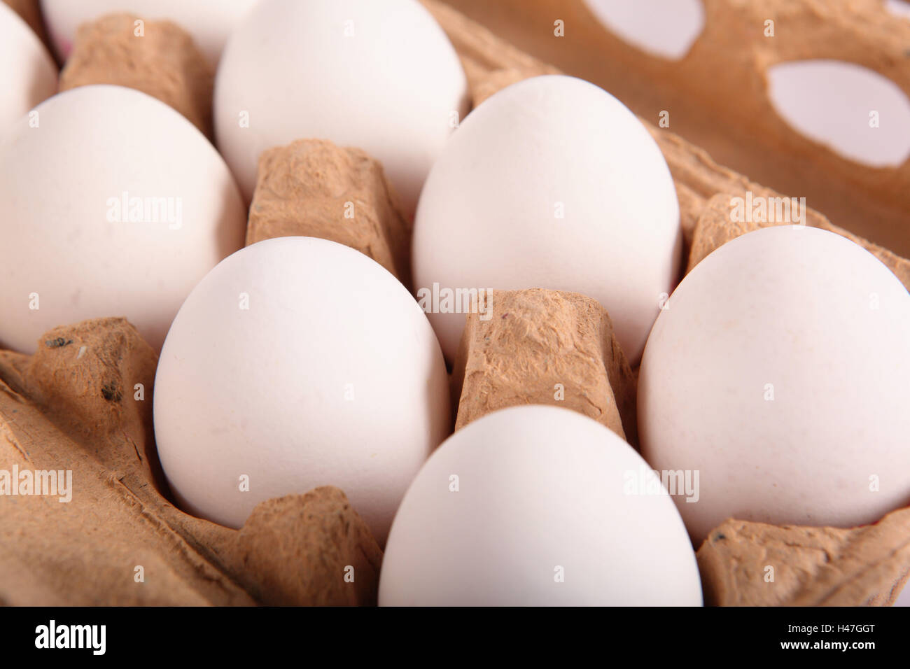 Eggs, white, opened envelope Stock Photo - Alamy