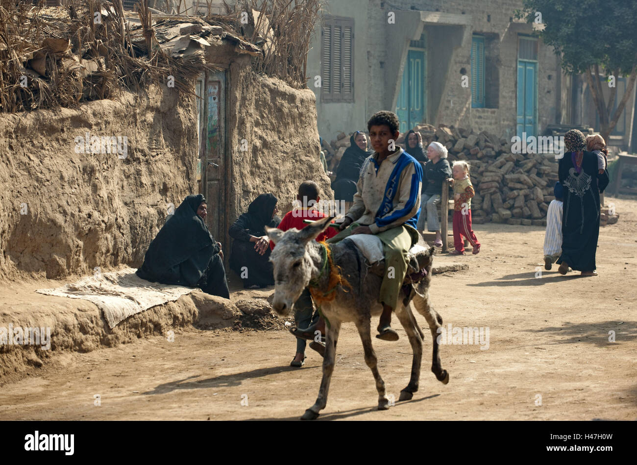 Egypt, street scene in the Coptic village Garagos to the north Luxor ...